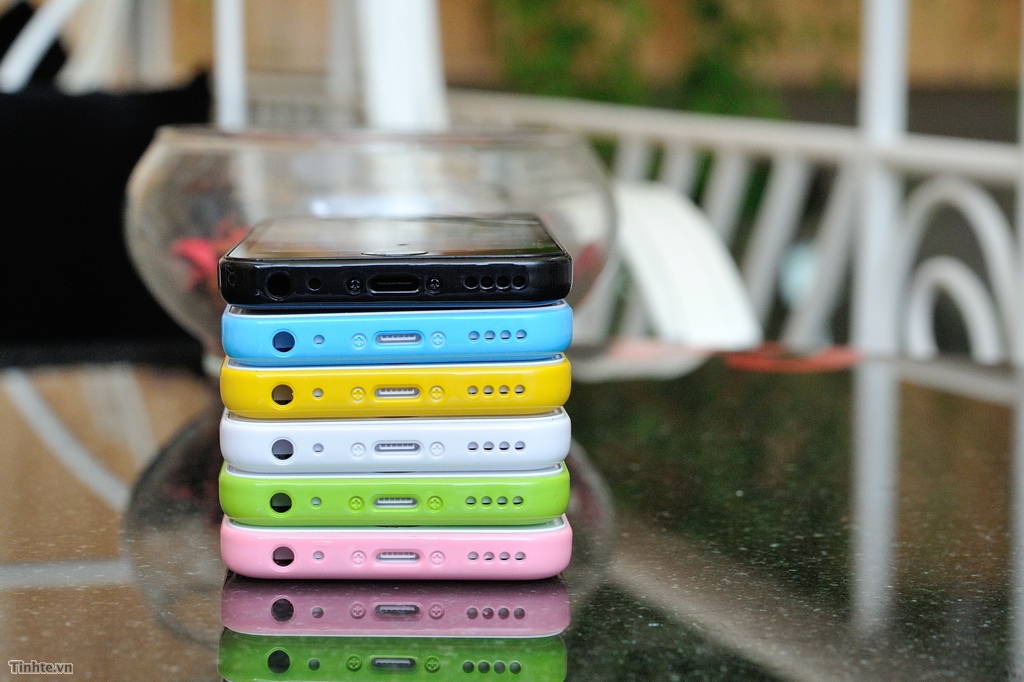 Plastic iPhone dummy units show altered color palette including pink ...