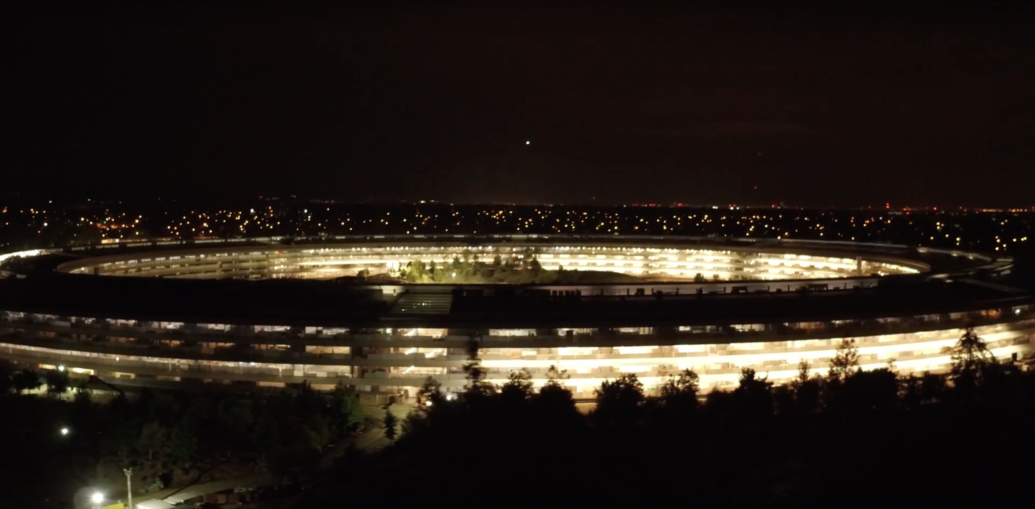 Latest drone footage shows work on Apple Park continuing into the night ...