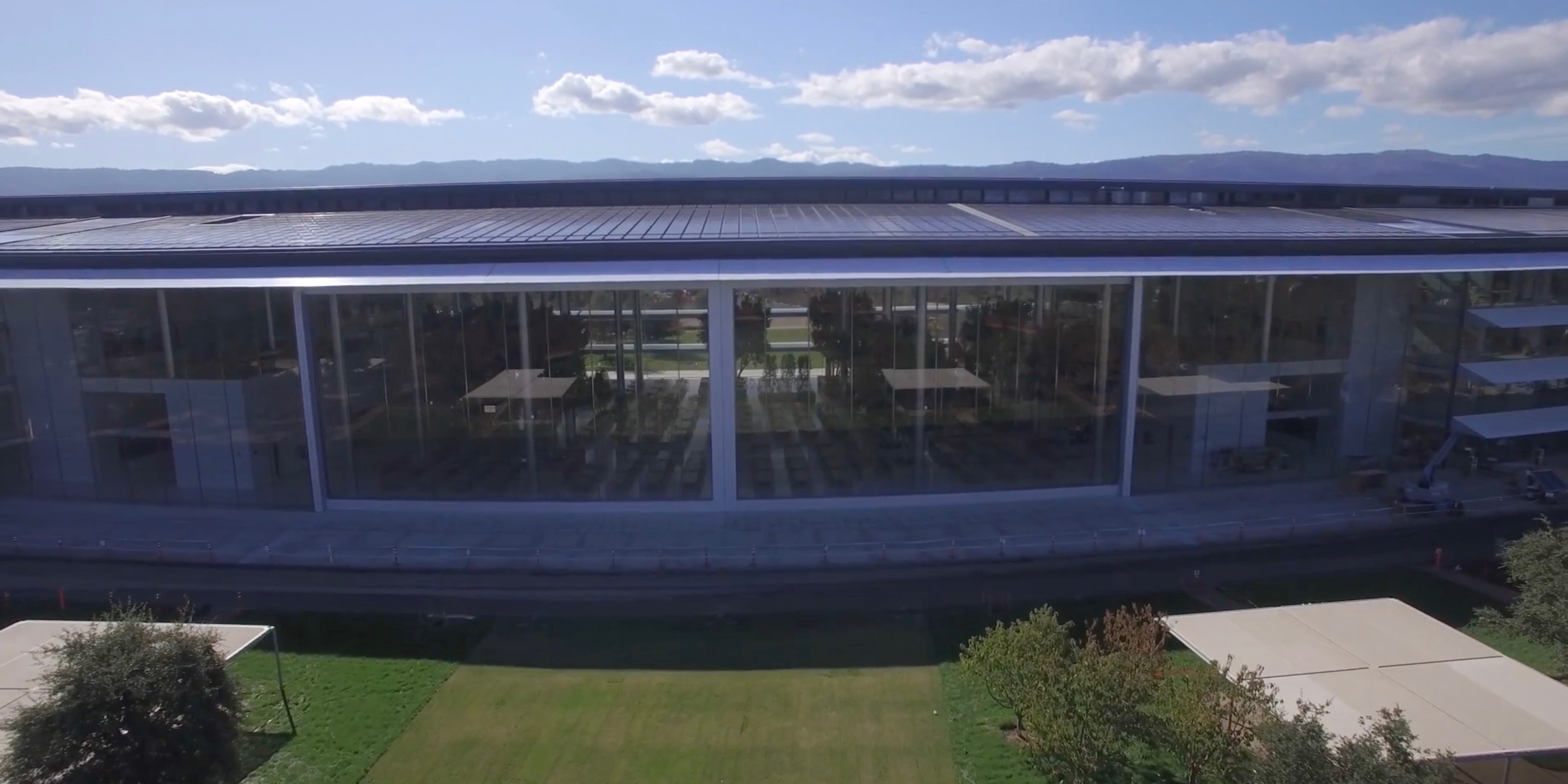 4K drone footage captures Apple Park Visitor Center from the sky, on ...
