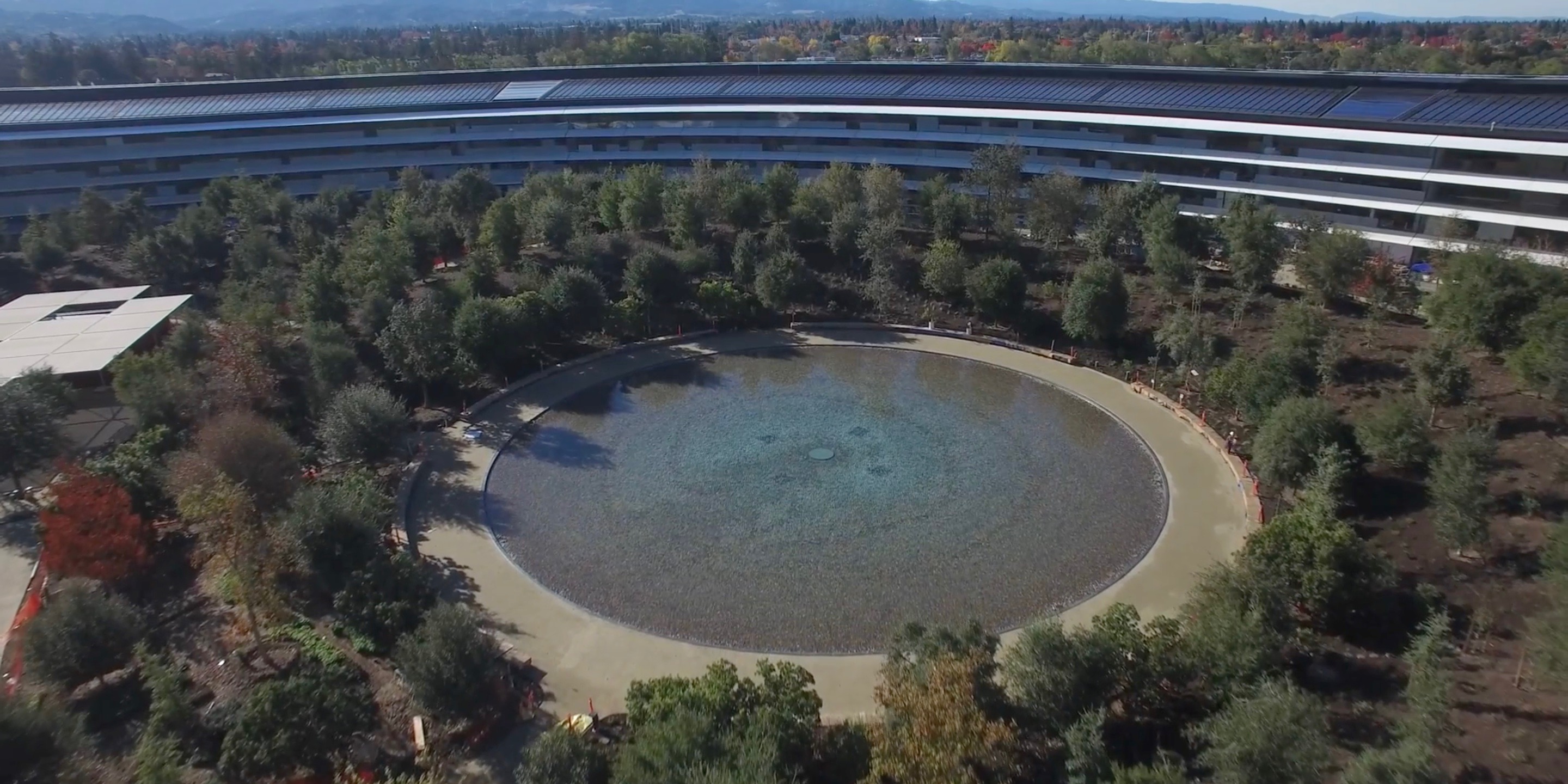 4K drone footage captures Apple Park Visitor Center from the sky, on ...