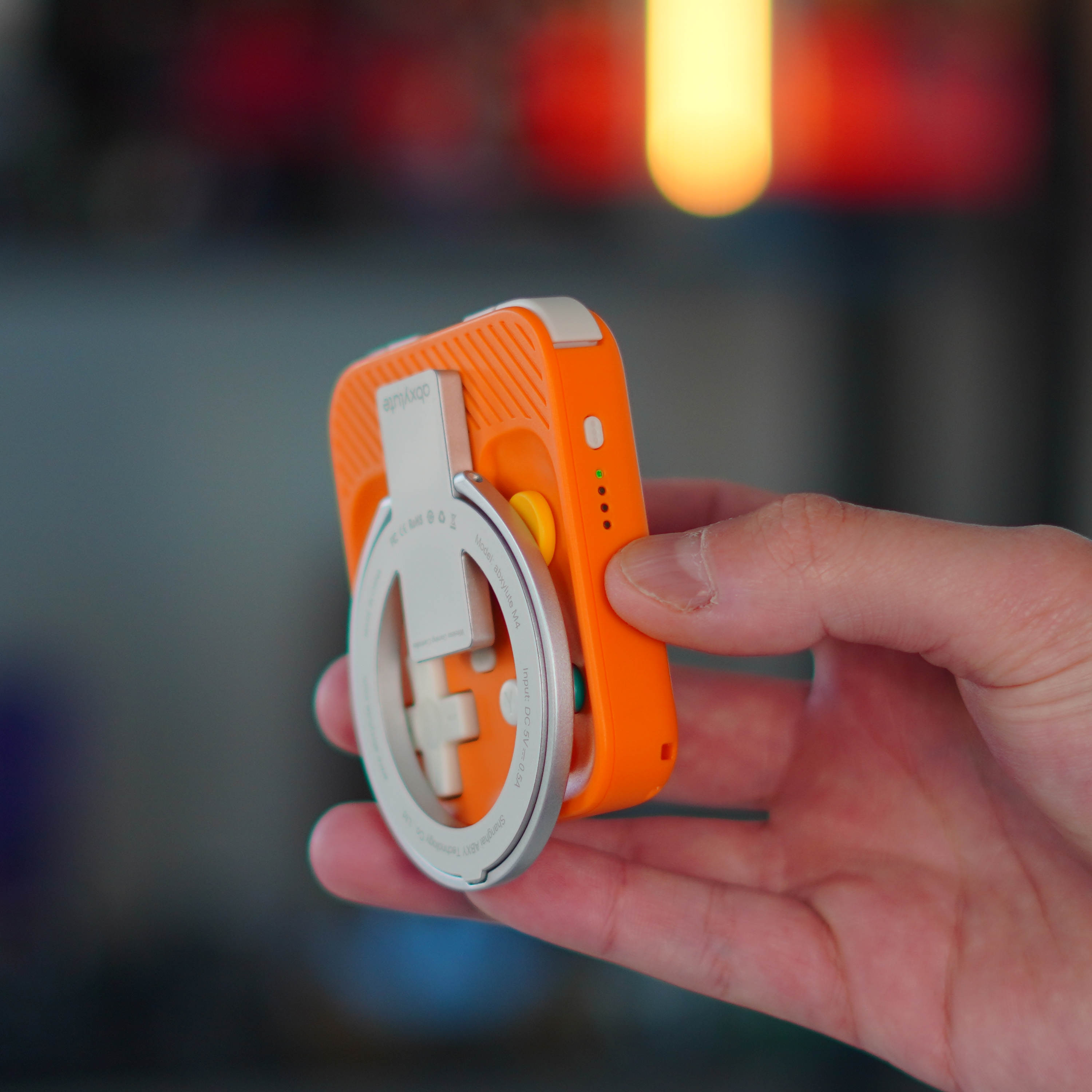 This tiny MagSafe controller brings real buttons to your iPhone - 9to5Mac